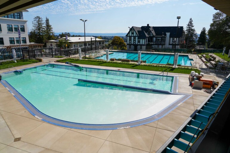Pools are filled with water as another construction milestone is met ...